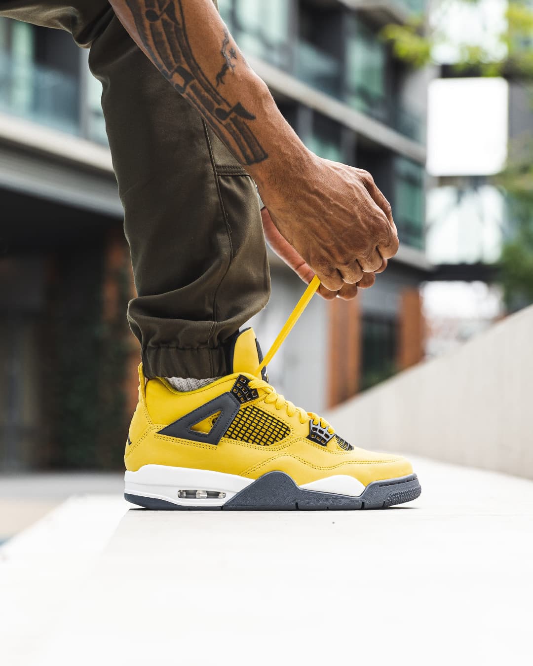 DTLR: Lightning Strike Air Jordan 4 'Tour Yellow' | Milled